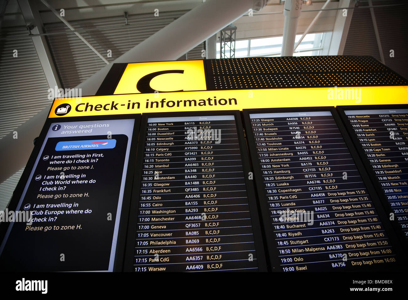 Air passenger departures and check-in information board at terminal ...