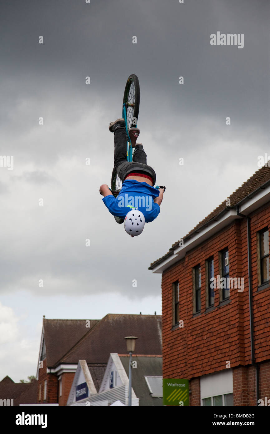Teenager performing somersault young hi-res stock photography and ...