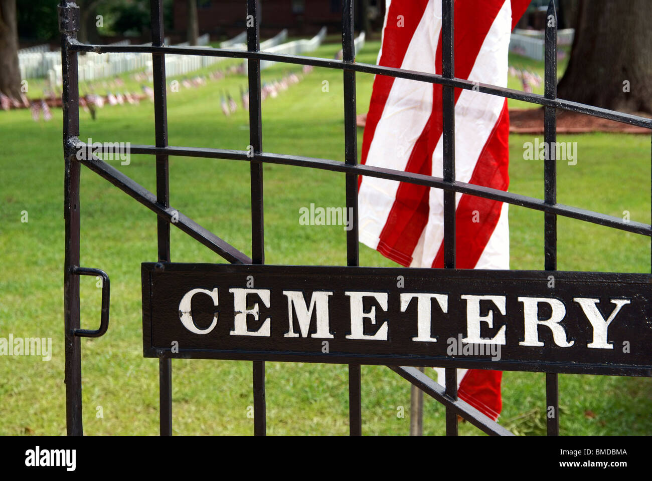 Gate leading into a cemetery Stock Photo - Alamy