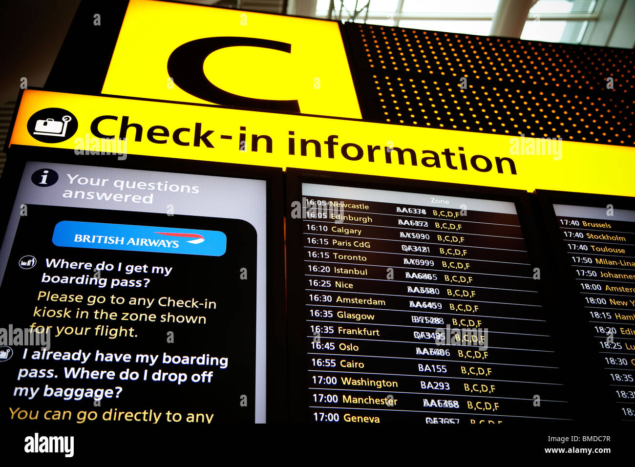 Air passenger departures and check-in information board at terminal ...