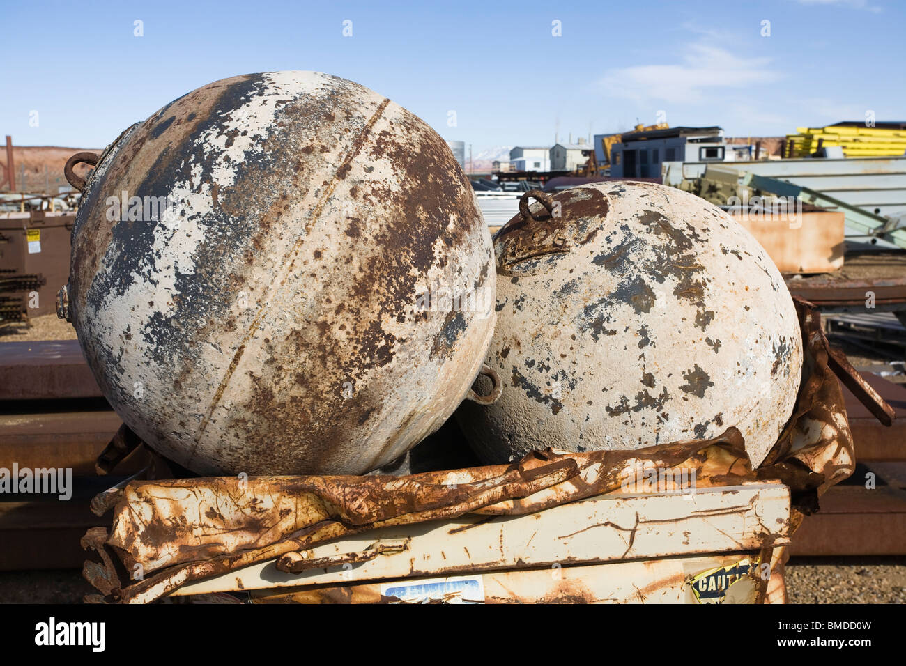Large iron mooring buoys in scrap yard Stock Photo - Alamy