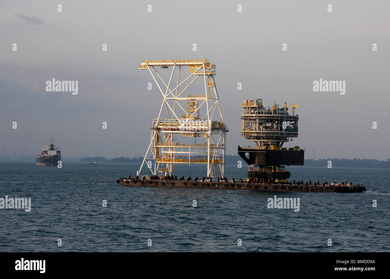 oil rig in a floating barge and oil tanker ship in the off shore of the ...