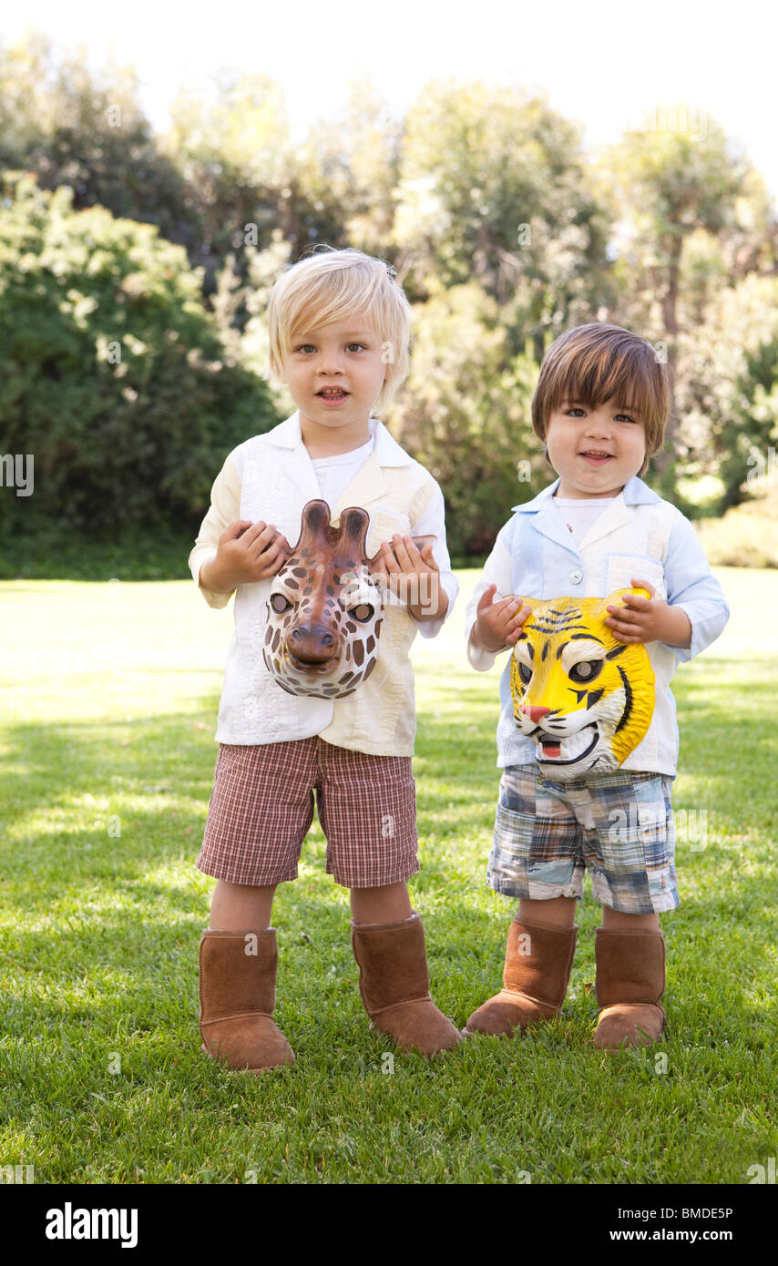 Young boys with animal masks Stock Photo - Alamy