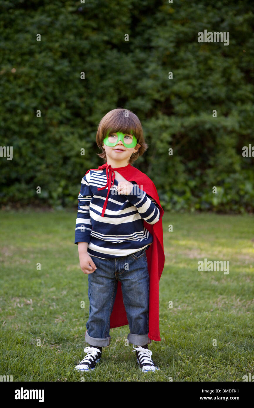 Boy in red cape playing hi-res stock photography and images - Alamy