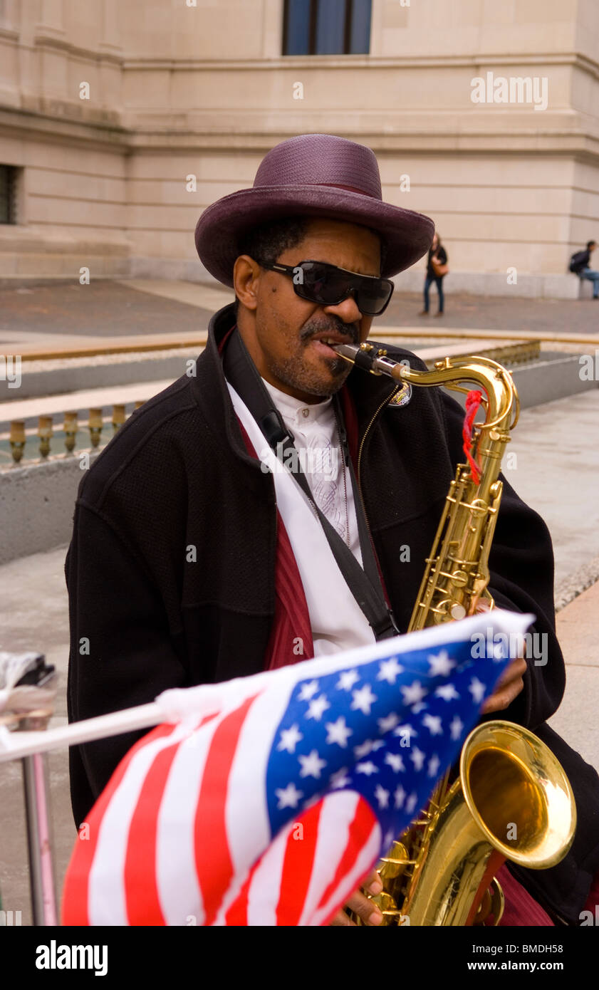 Black African American man playing Jazz on saxophone in Central Park of ...