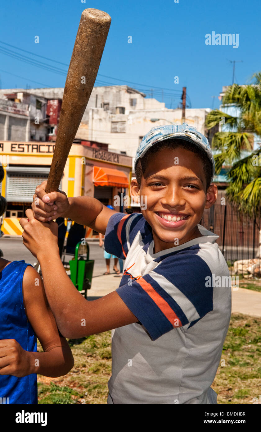Young boy happy with baseball bat portrait in park in Havana Habana ...