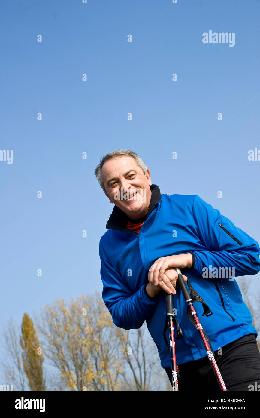Stick taking something hi-res stock photography and images - Alamy