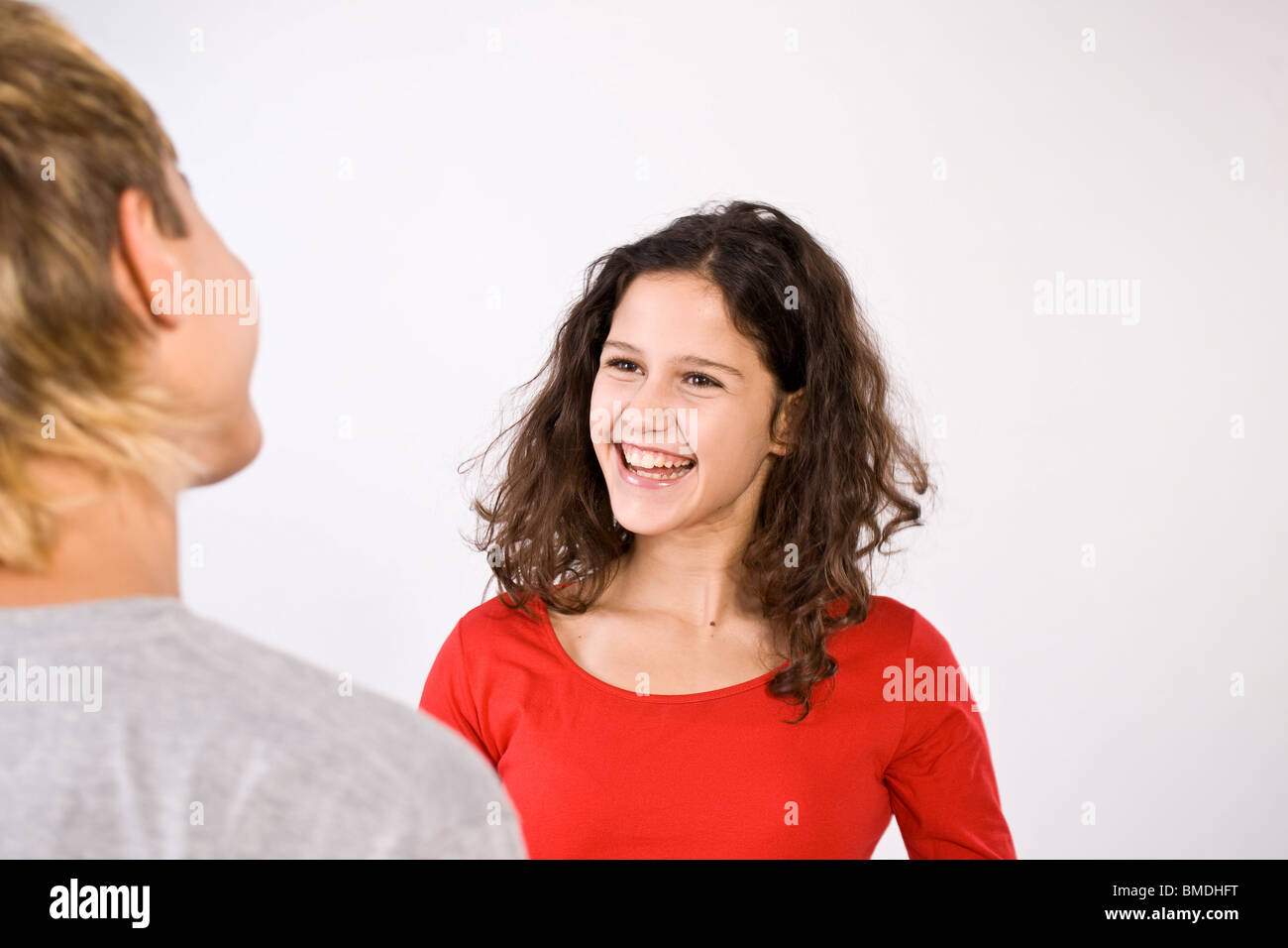 Two Teenagers Talking to Each Other Stock Photo - Alamy