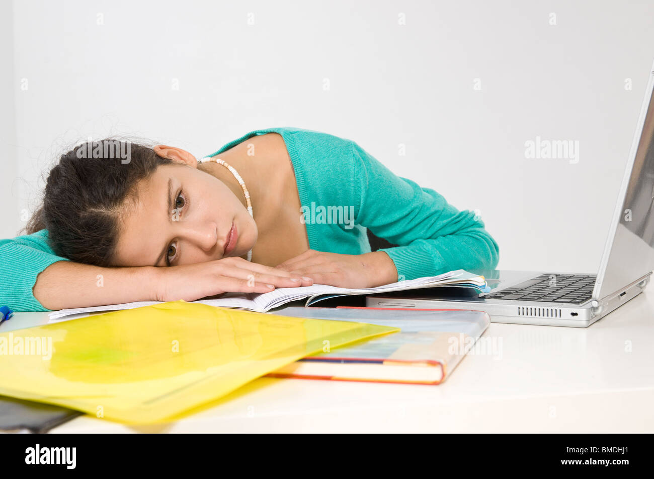 Girl Taking a Break from Homework Stock Photo - Alamy