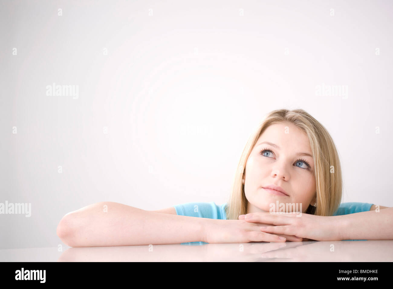 Woman with Head on Hands Stock Photo - Alamy