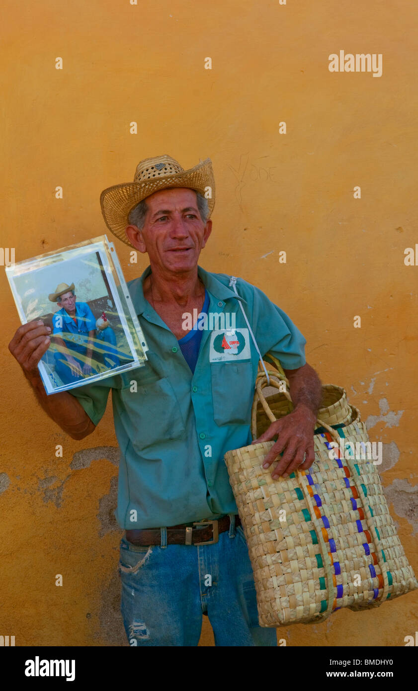 Local man given portrait of himself proudly shows in Trinidad Cuba ...