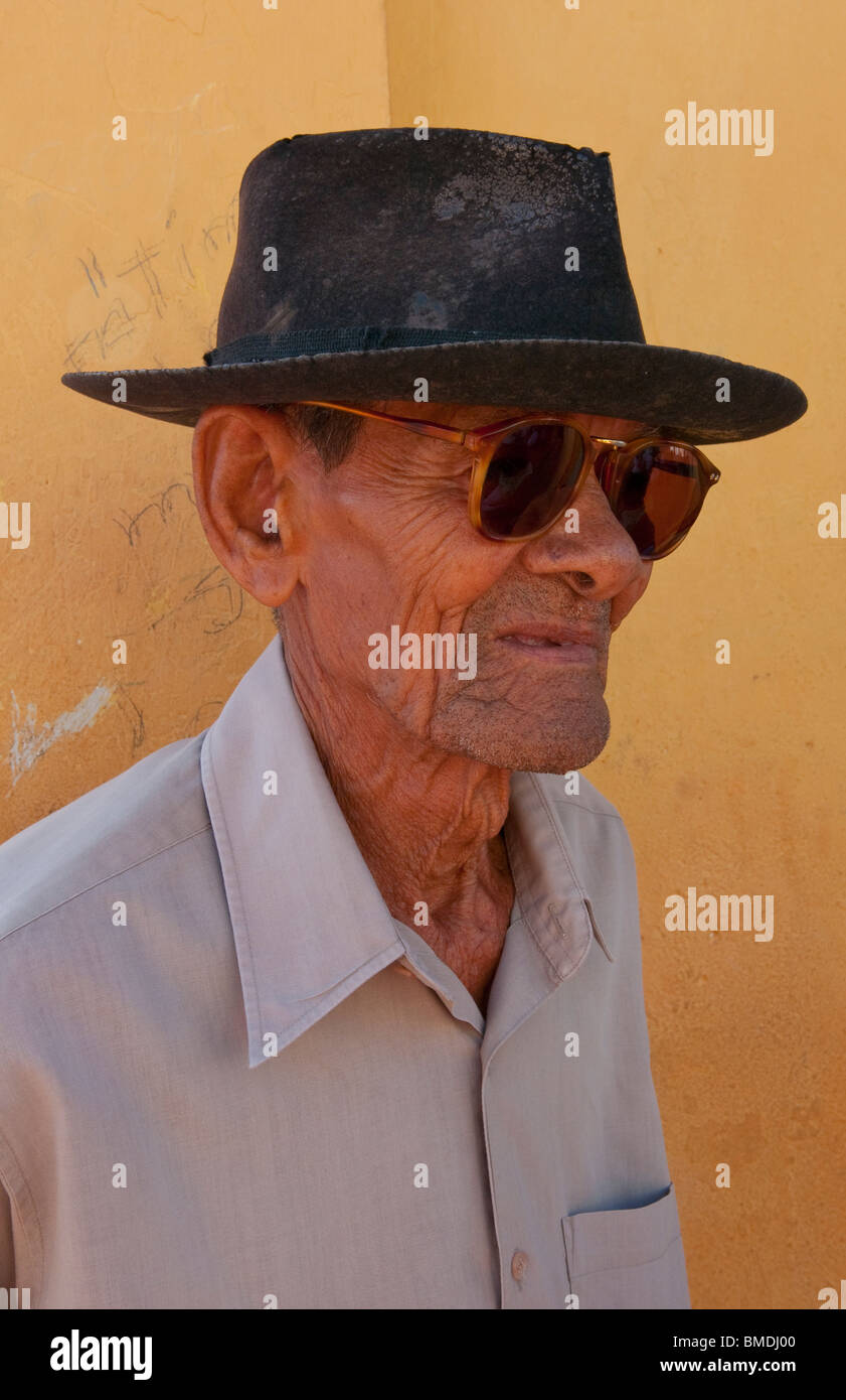 Portrait of local colorful man in Trinidad Cuba Stock Photo - Alamy
