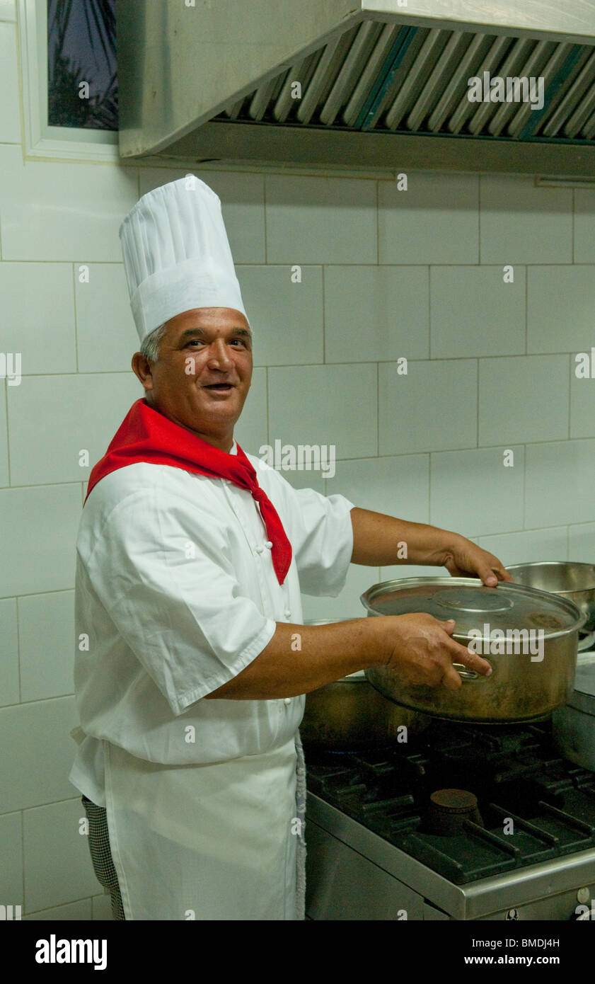 Chef in kitchen cooking in Trinidad Cuba Stock Photo - Alamy