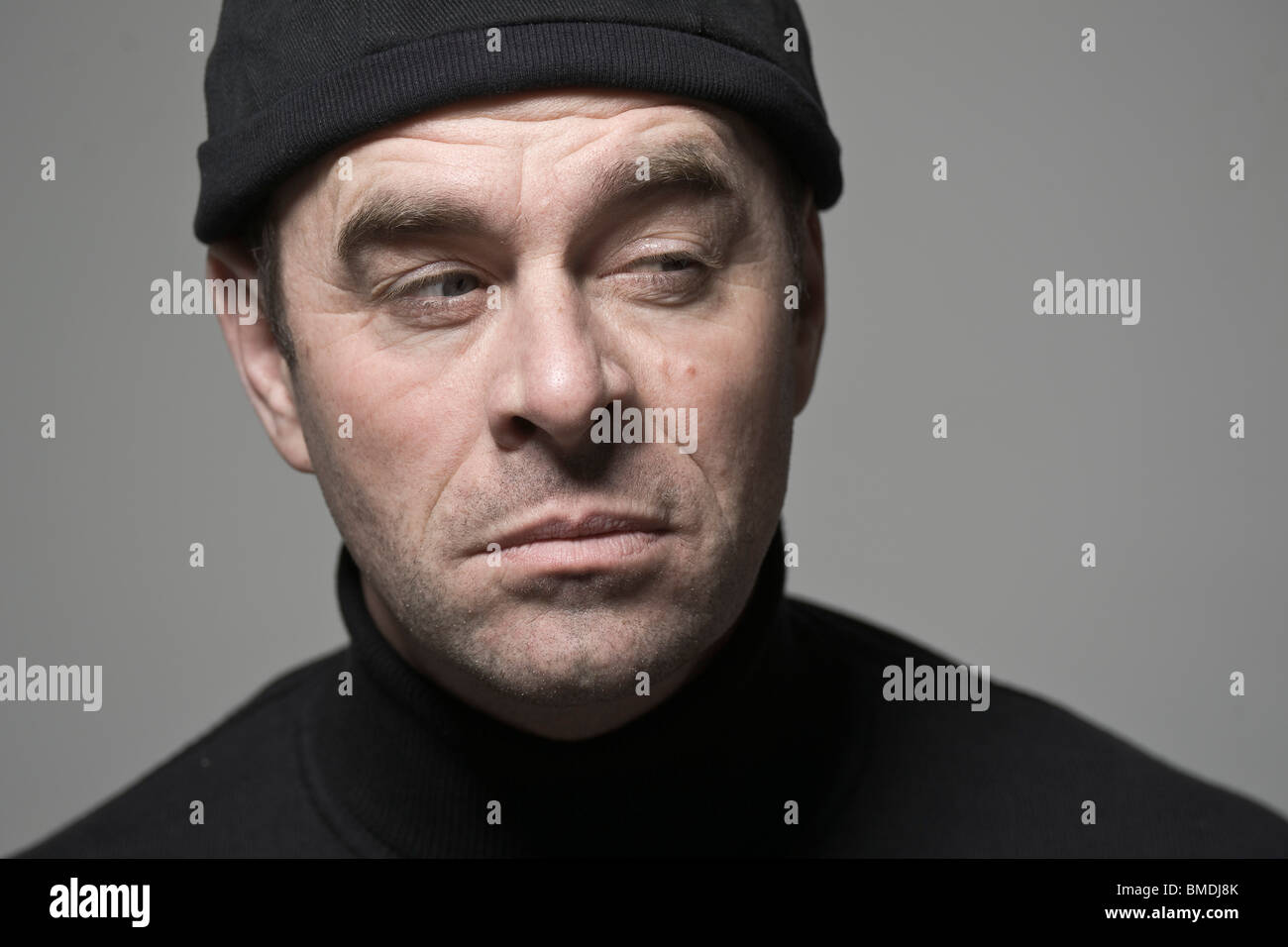 Portrait of Man in Black Cap Stock Photo - Alamy