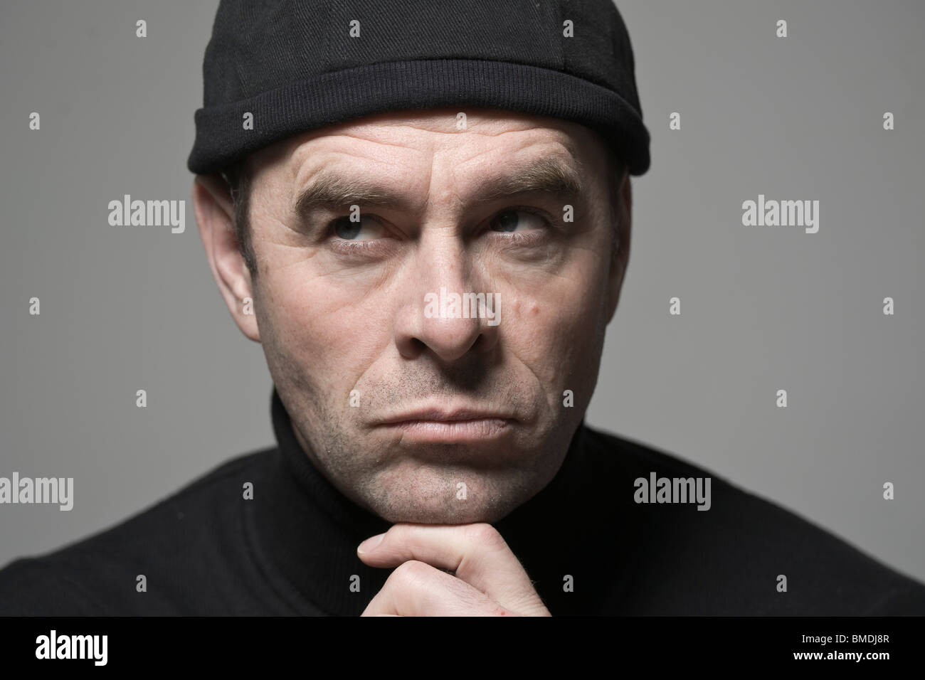 Portrait of Man Thinking Stock Photo - Alamy