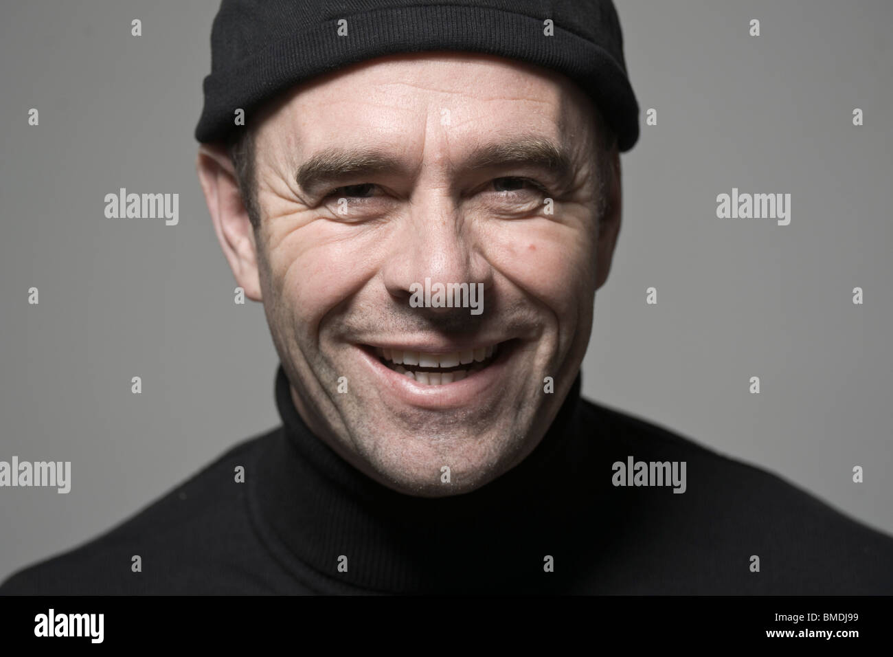 Portrait of Man in Black Cap Stock Photo - Alamy