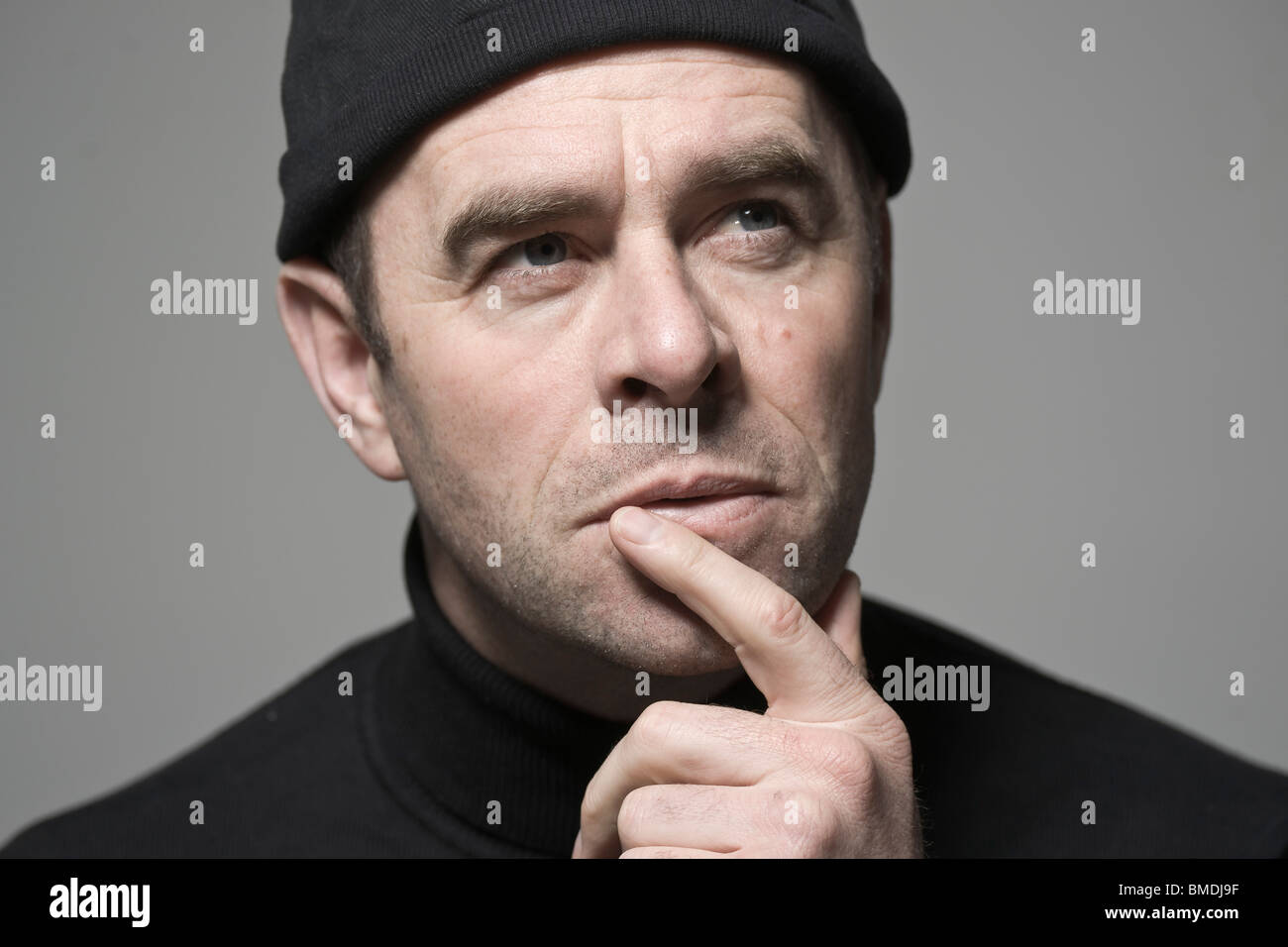 Portrait of Man Thinking Stock Photo - Alamy