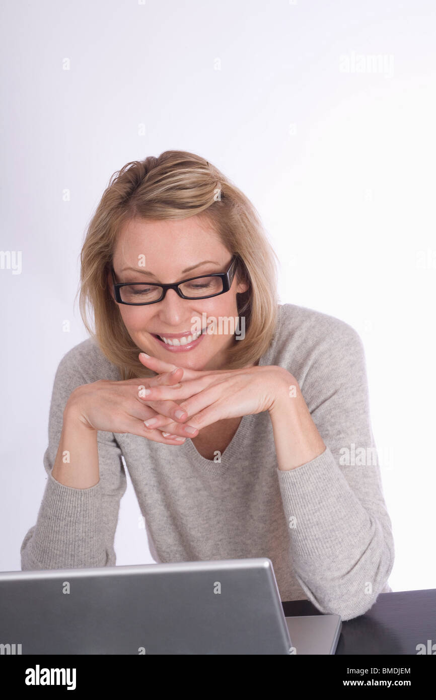 Woman Using Laptop Computer Stock Photo - Alamy
