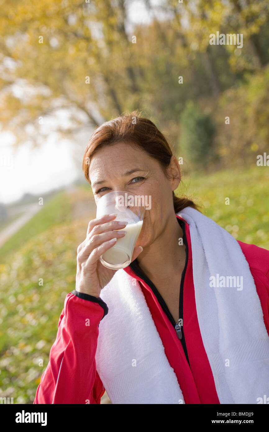 Portrait of Woman Drinking Milk Stock Photo - Alamy