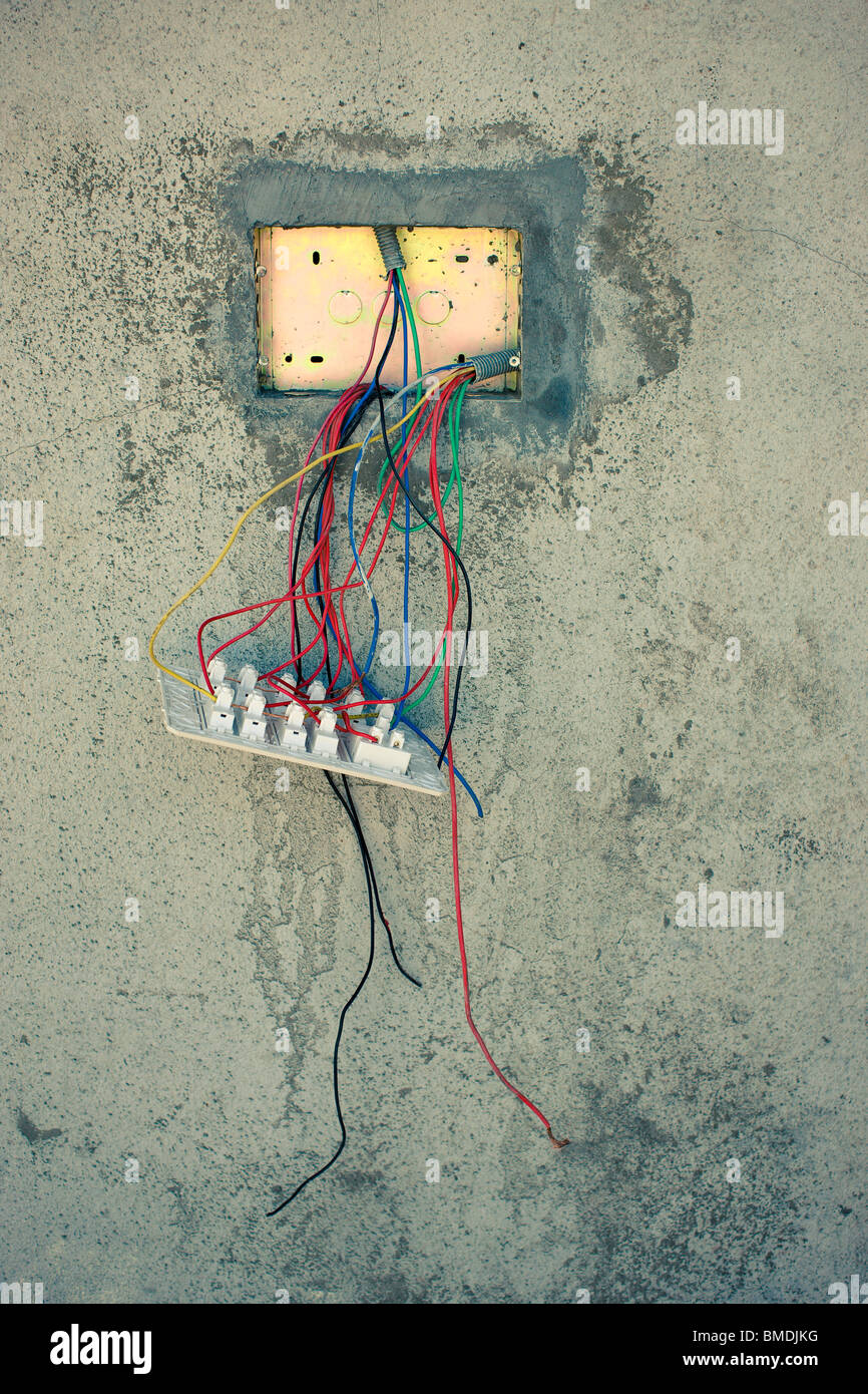 Wires Hanging out of Wall in New Home Stock Photo - Alamy