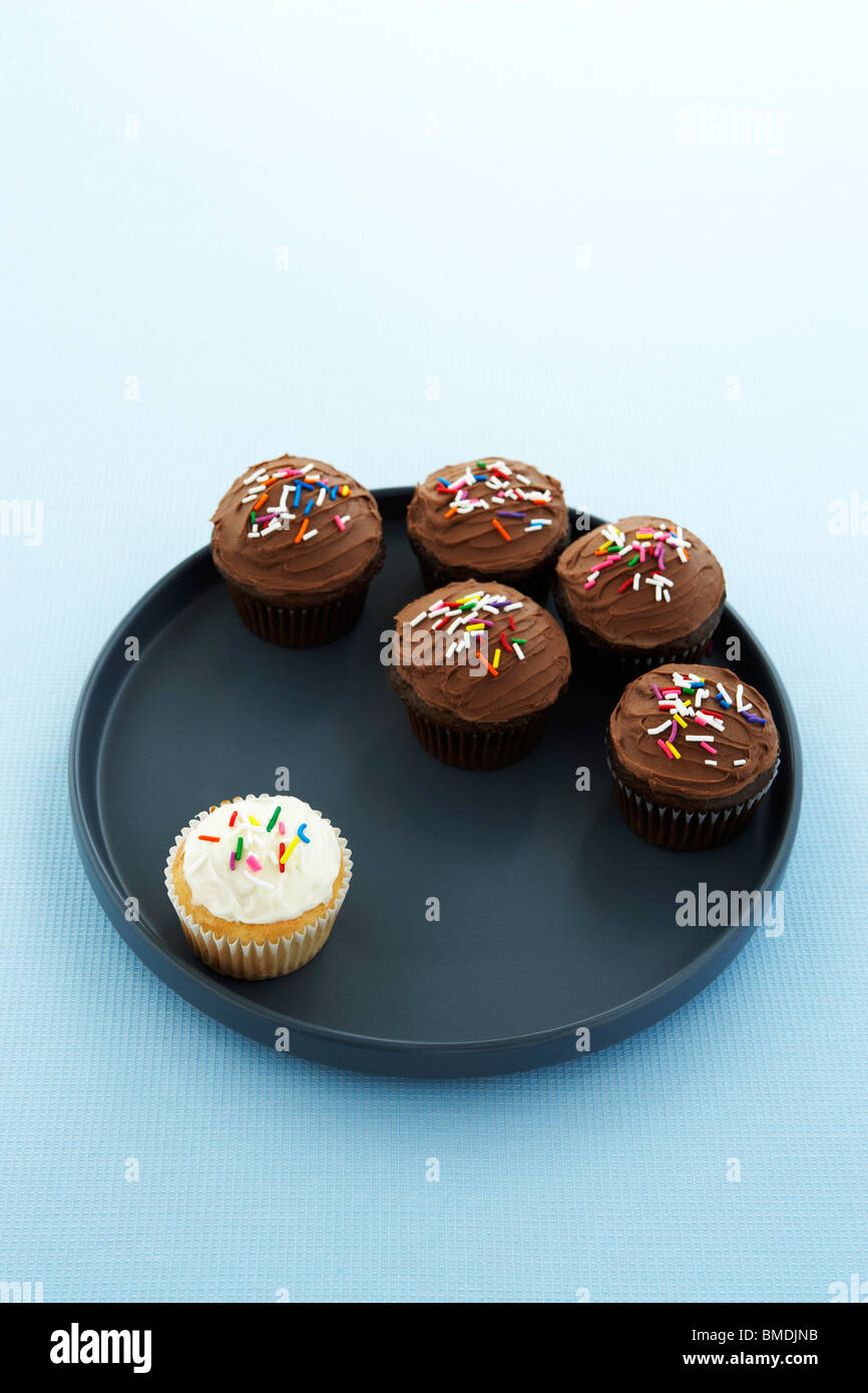 Vanilla Cupcake Seperated from Chocolate Cupcakes Stock Photo - Alamy