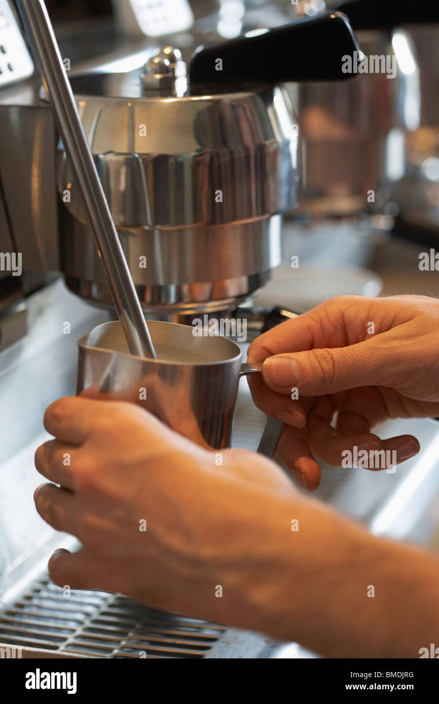 Making a Latte Stock Photo - Alamy