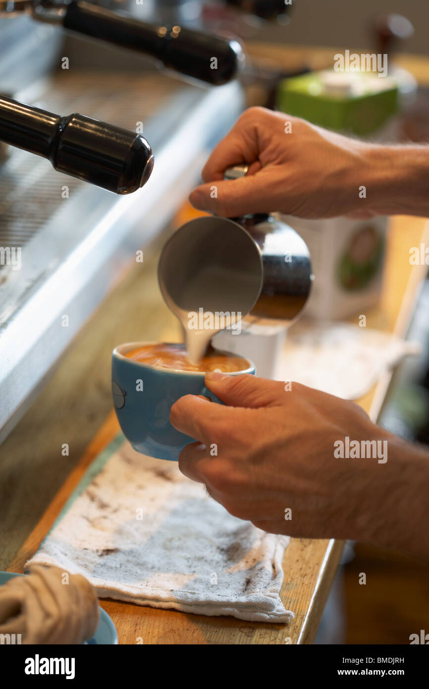 Making a Latte Stock Photo - Alamy