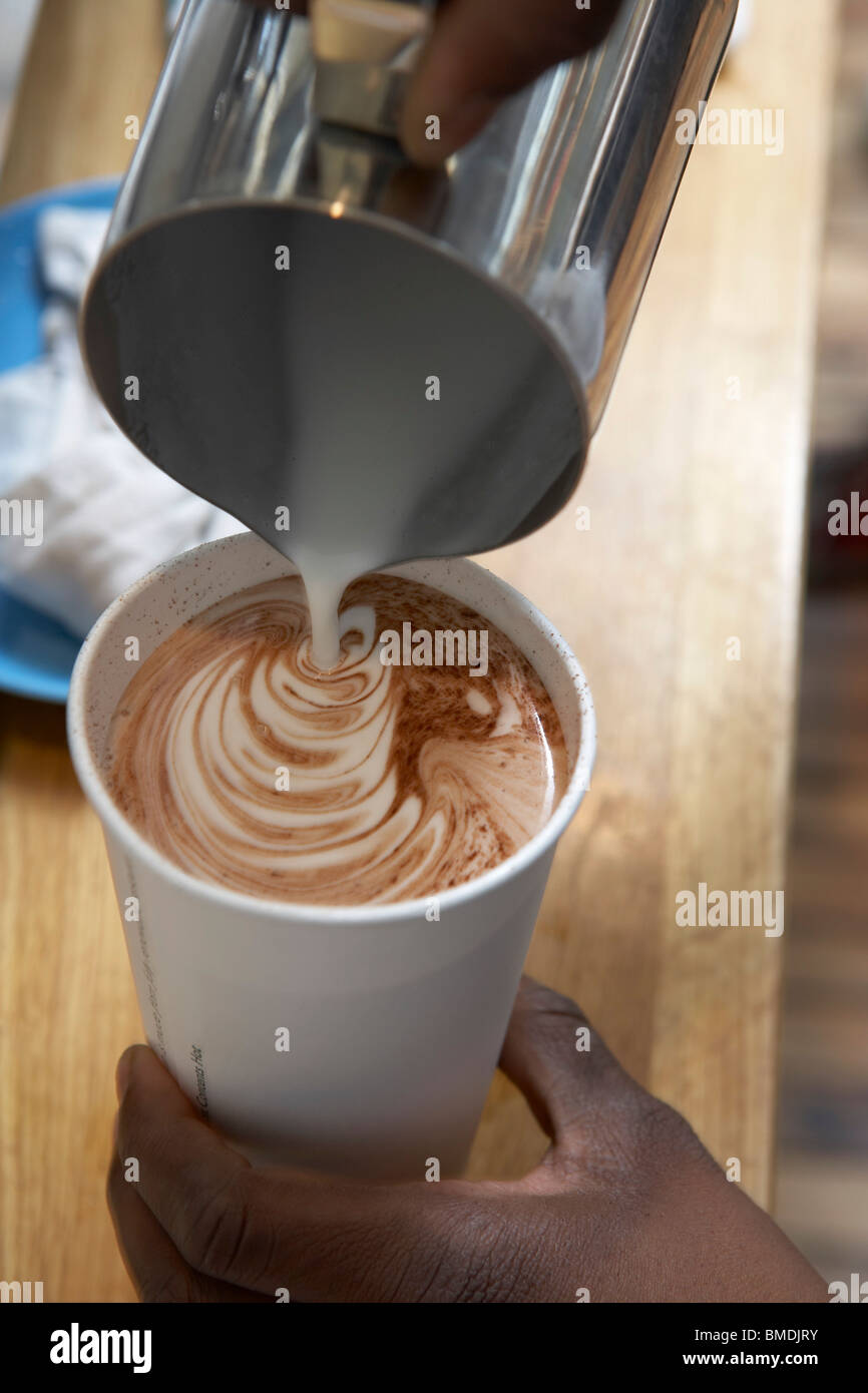 African lady making food hi-res stock photography and images - Alamy