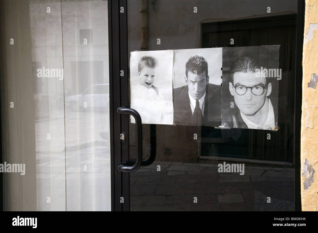 Barbershop window hairstyles Stock Photo - Alamy
