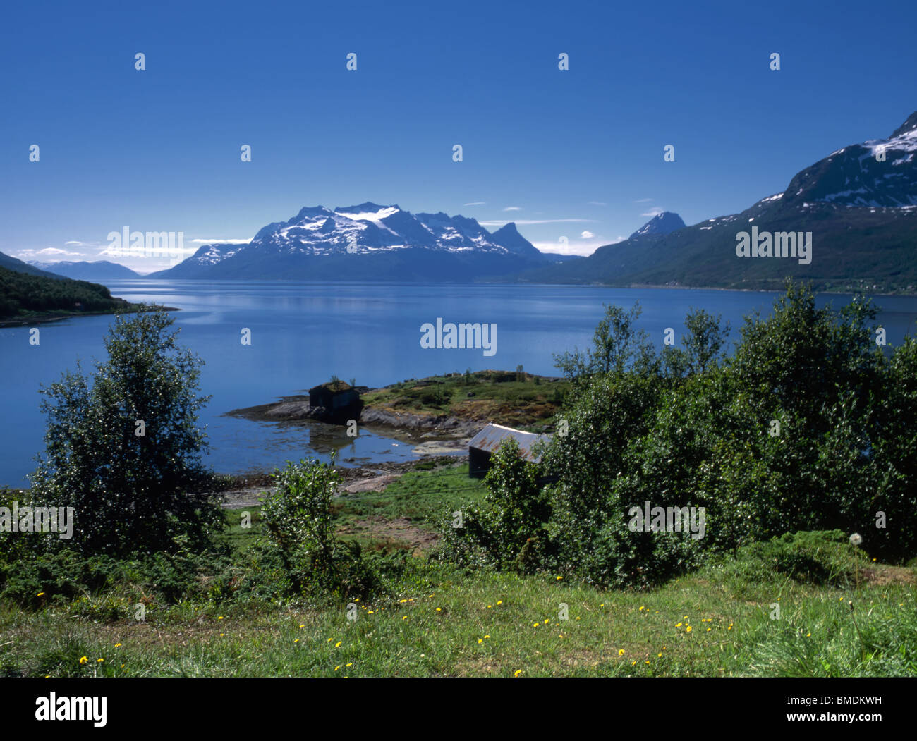 Beautiful view of ocean fjord in Norway with snow mountains Stock Photo ...