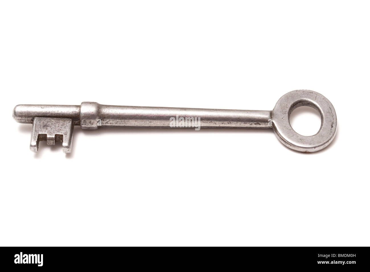 Old key isolated on white background Stock Photo - Alamy