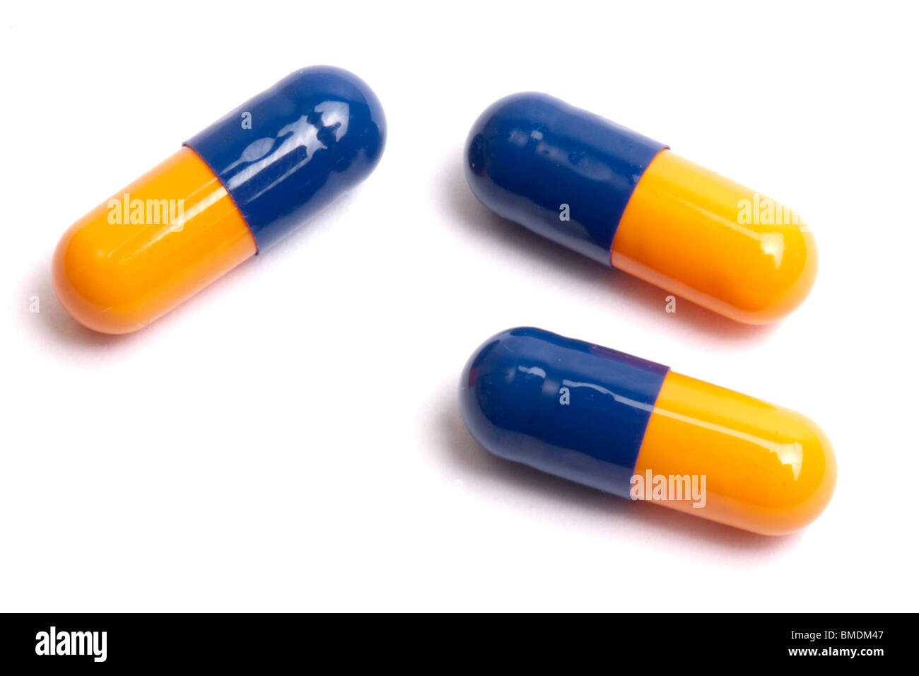 Capsules isolated on white background Stock Photo - Alamy