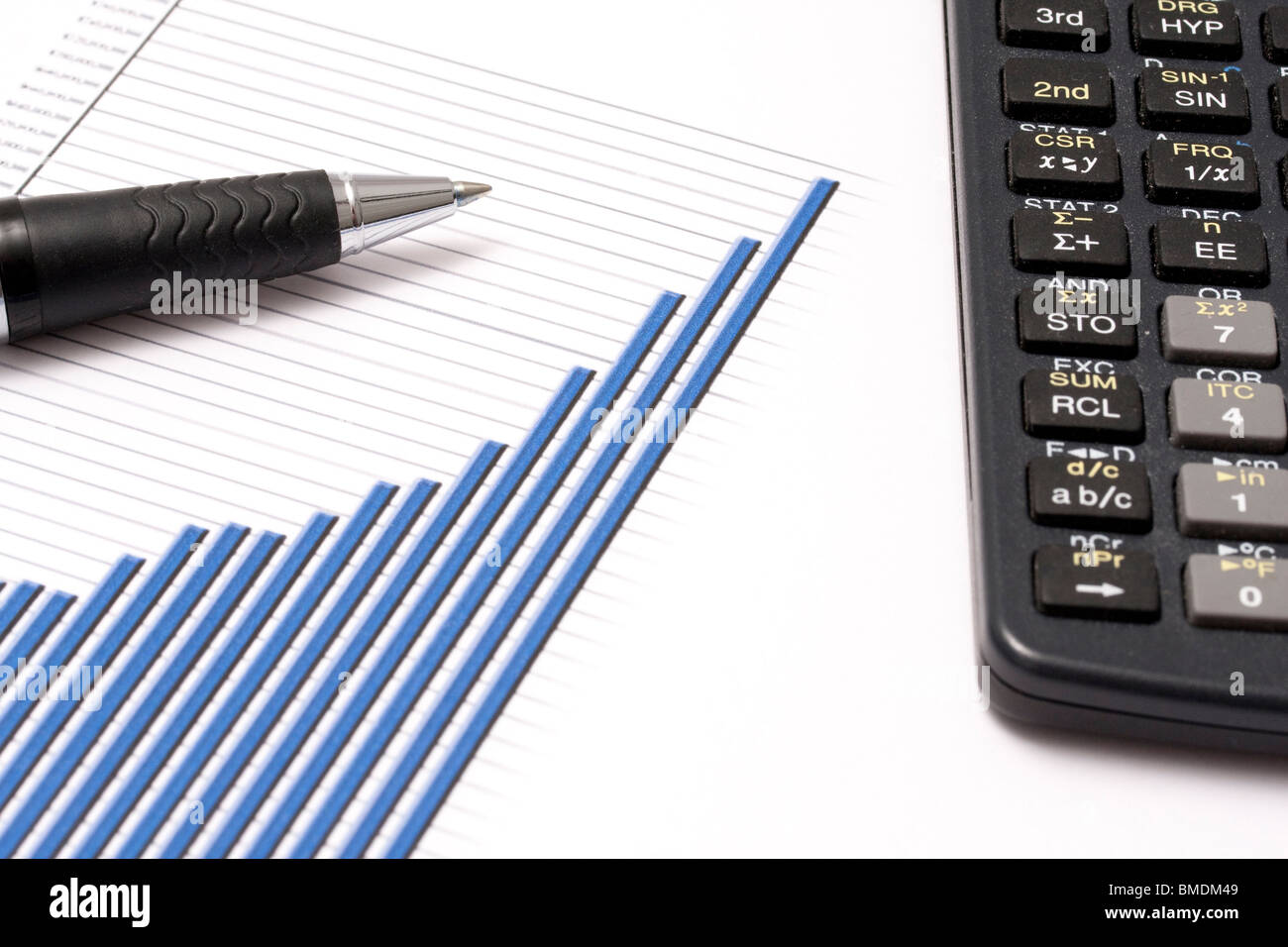 Business graph and a pen Stock Photo - Alamy