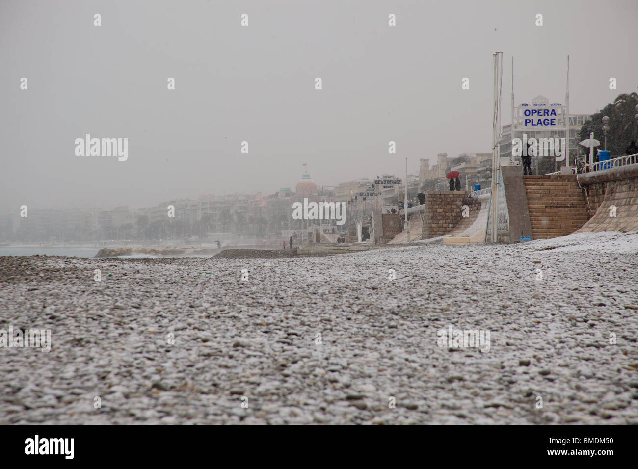 Snowed beach in winter time in Nice city. Snow in French Riviera is ...