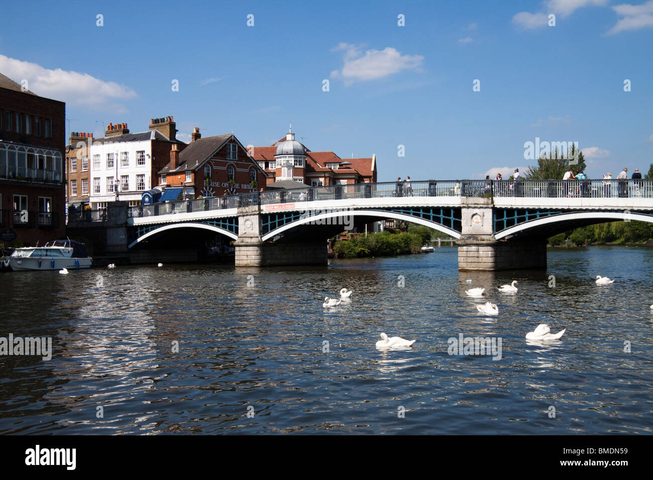 The Windsor bridge crossing over the River Thames into Eton, Berkshire ...