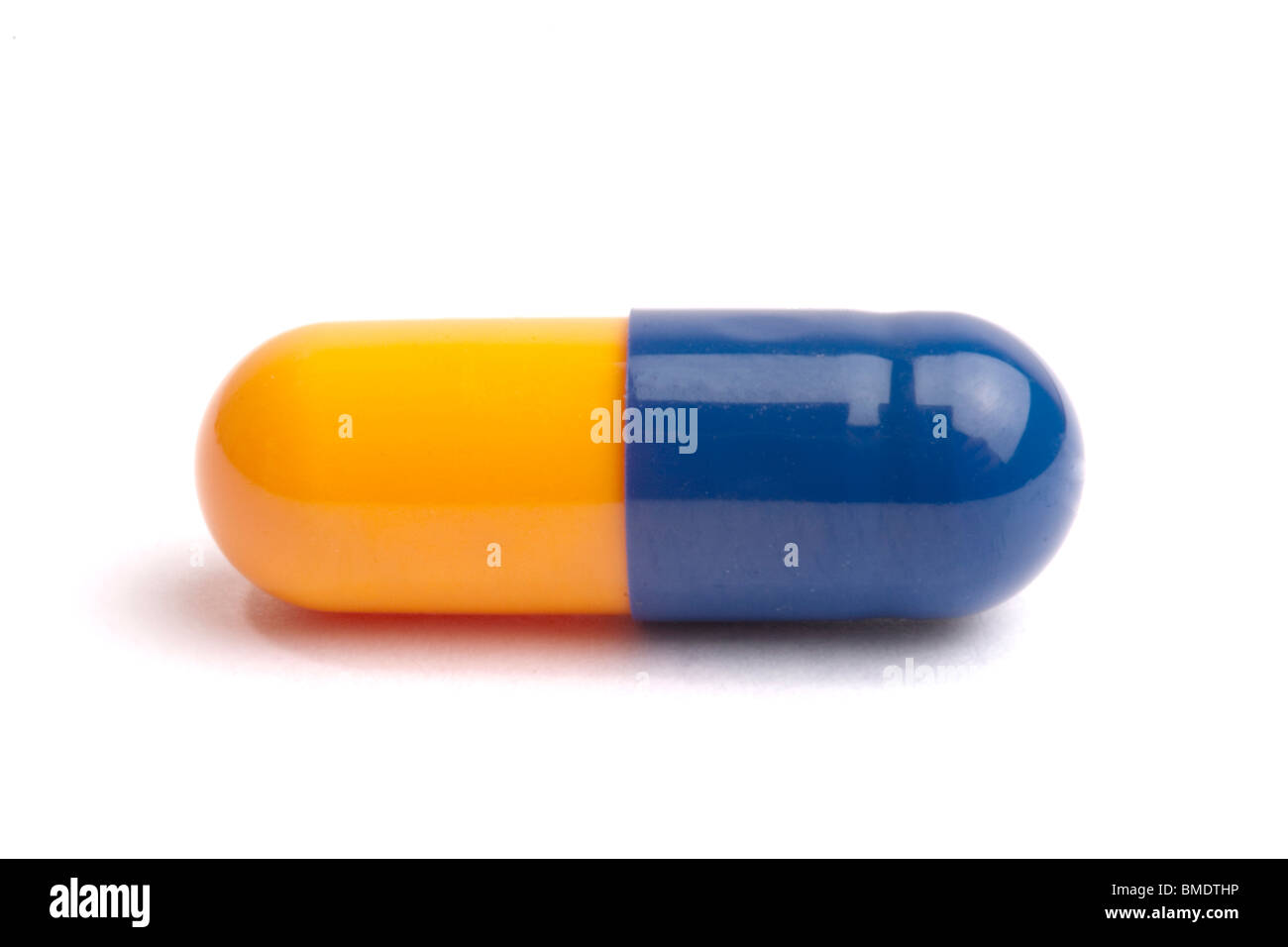 capsule isolated on white Stock Photo - Alamy
