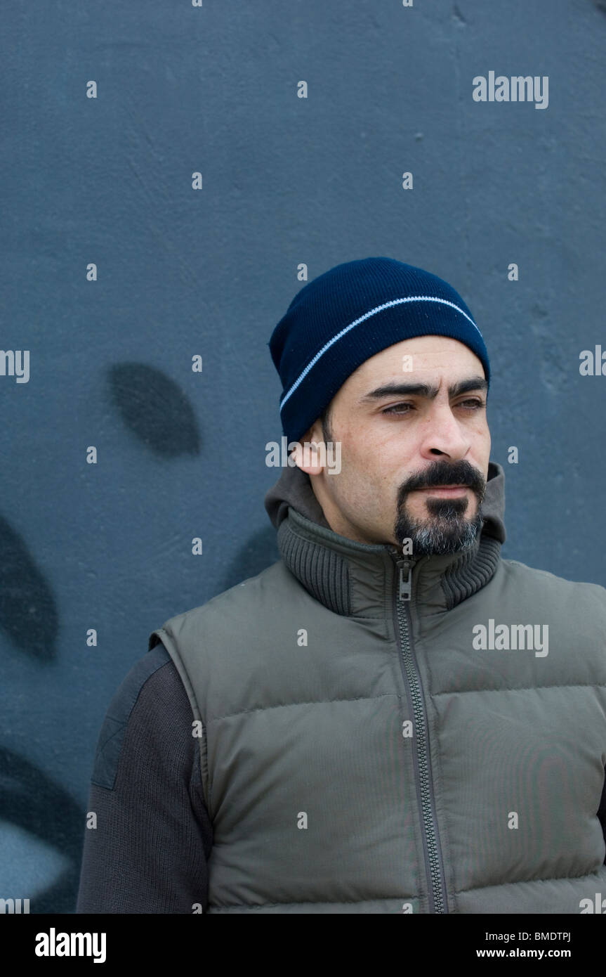Portrait of a Middle Eastern man looking away in East Berlin Germany ...