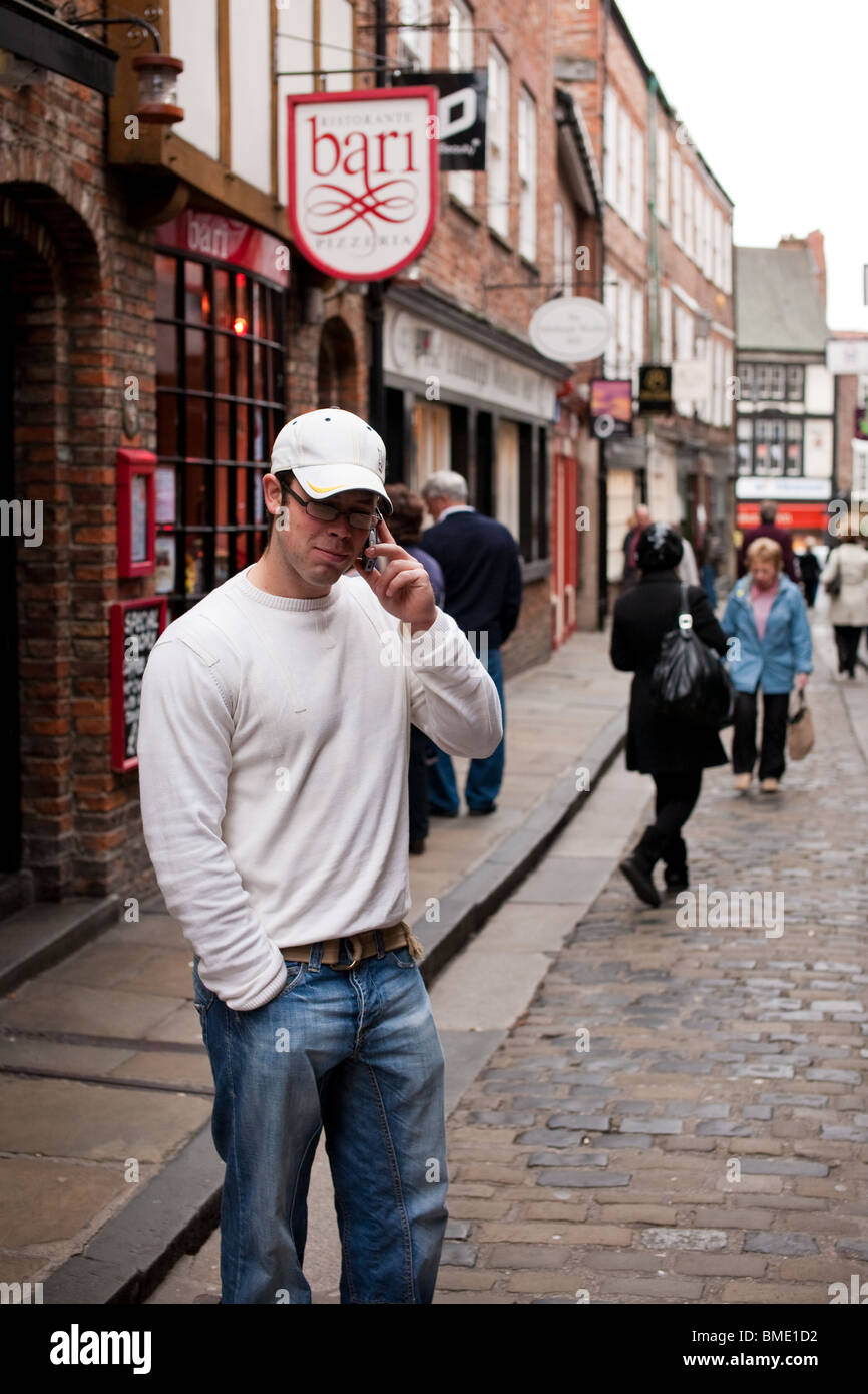 Pedestrian on Mobile Phone inYork, England Stock Photo - Alamy