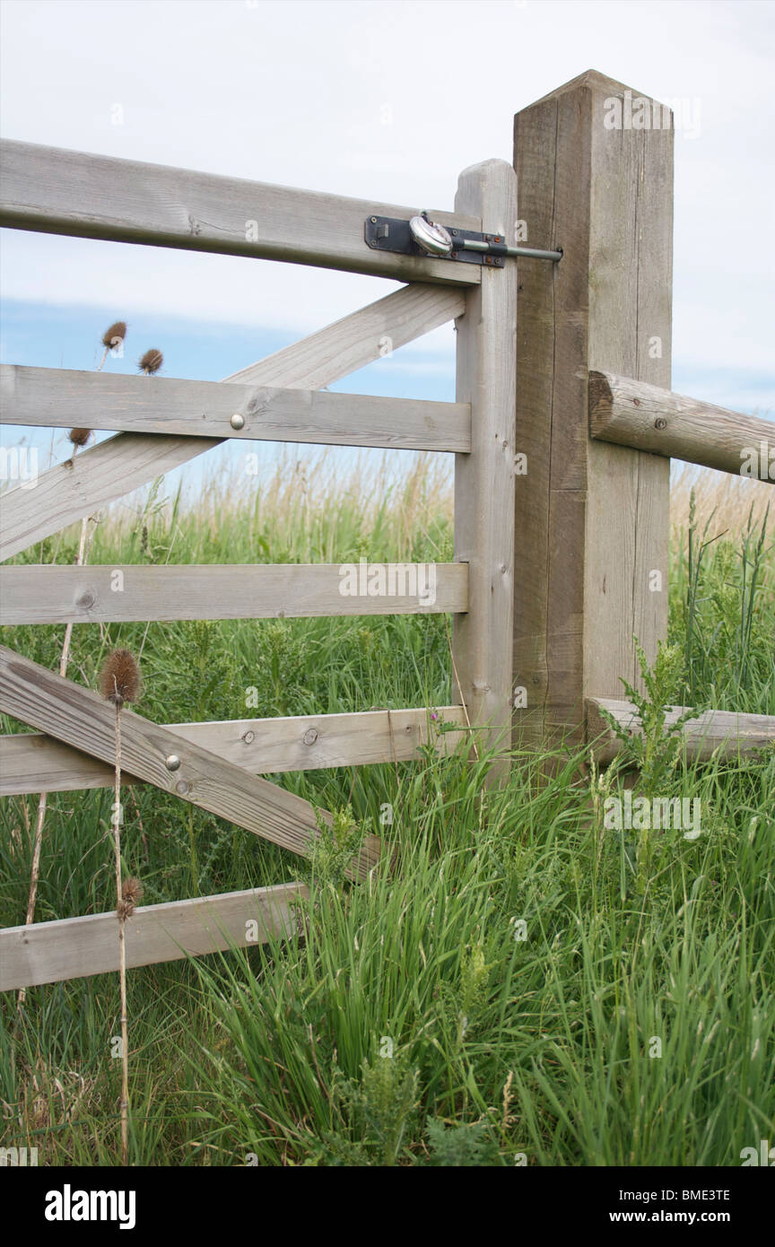 Locked wooden gate in a field - Newport Wetlands South Wales Stock ...