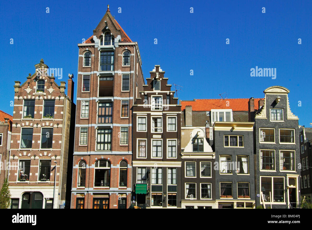 canalside buildings and warehouses in central Amsterdam Holland The ...