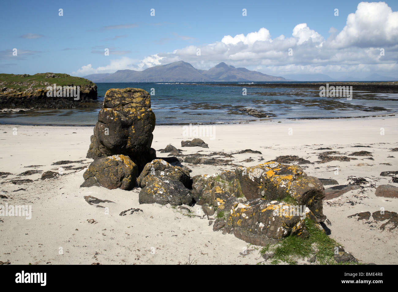 Beach on the Isle of Muck with the Isle of Rum in the background ...