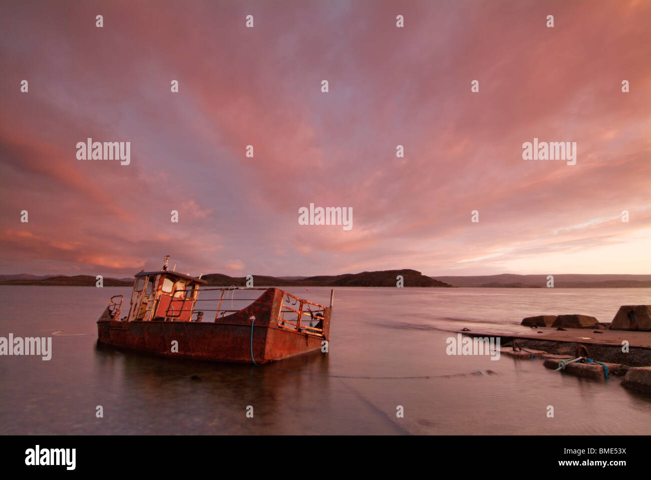 Sunset Wrecked fishing boat in Loch Ewe Aultbea Wester Ross North West ...