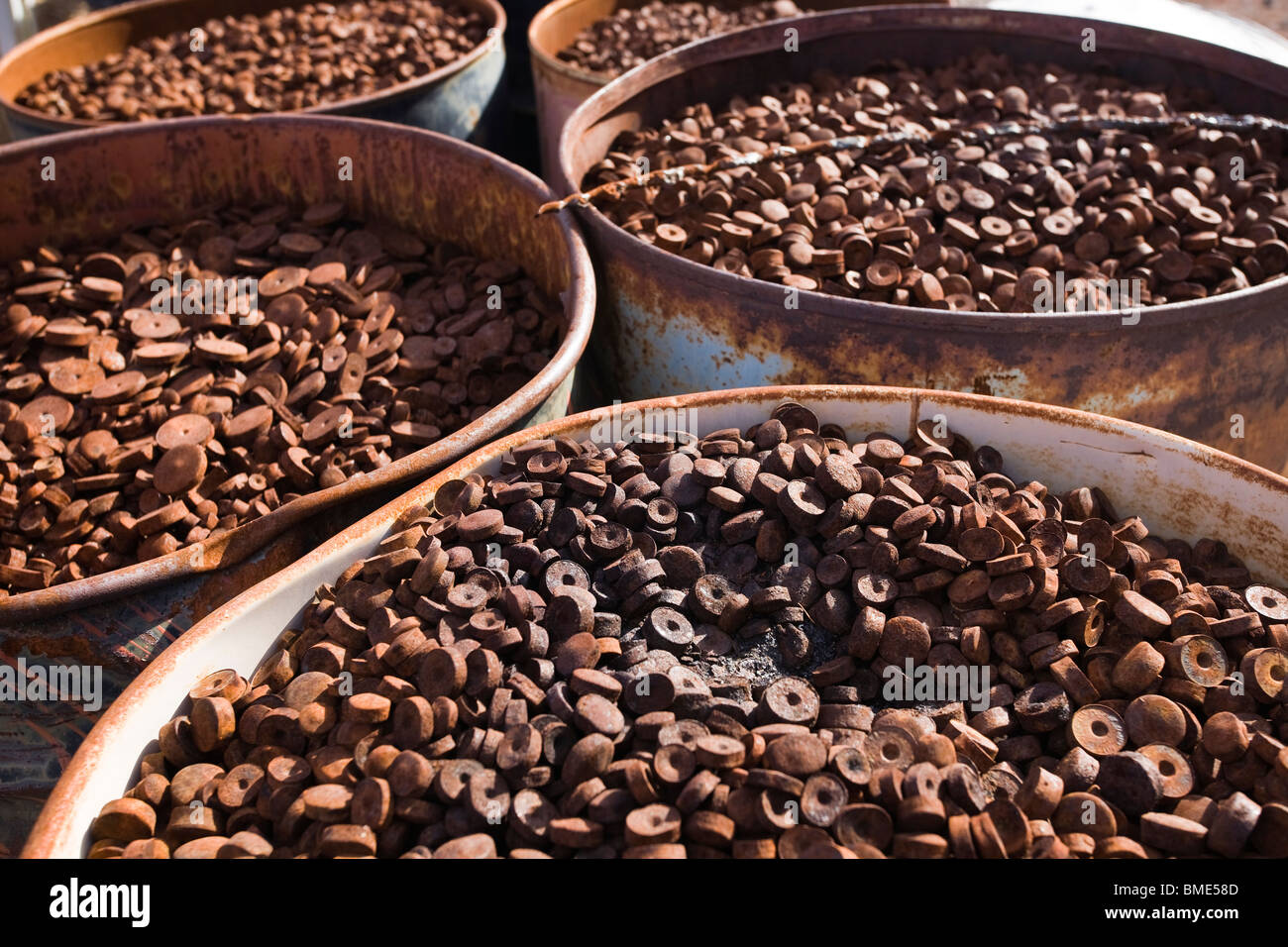 Iron disk punchouts Stock Photo - Alamy