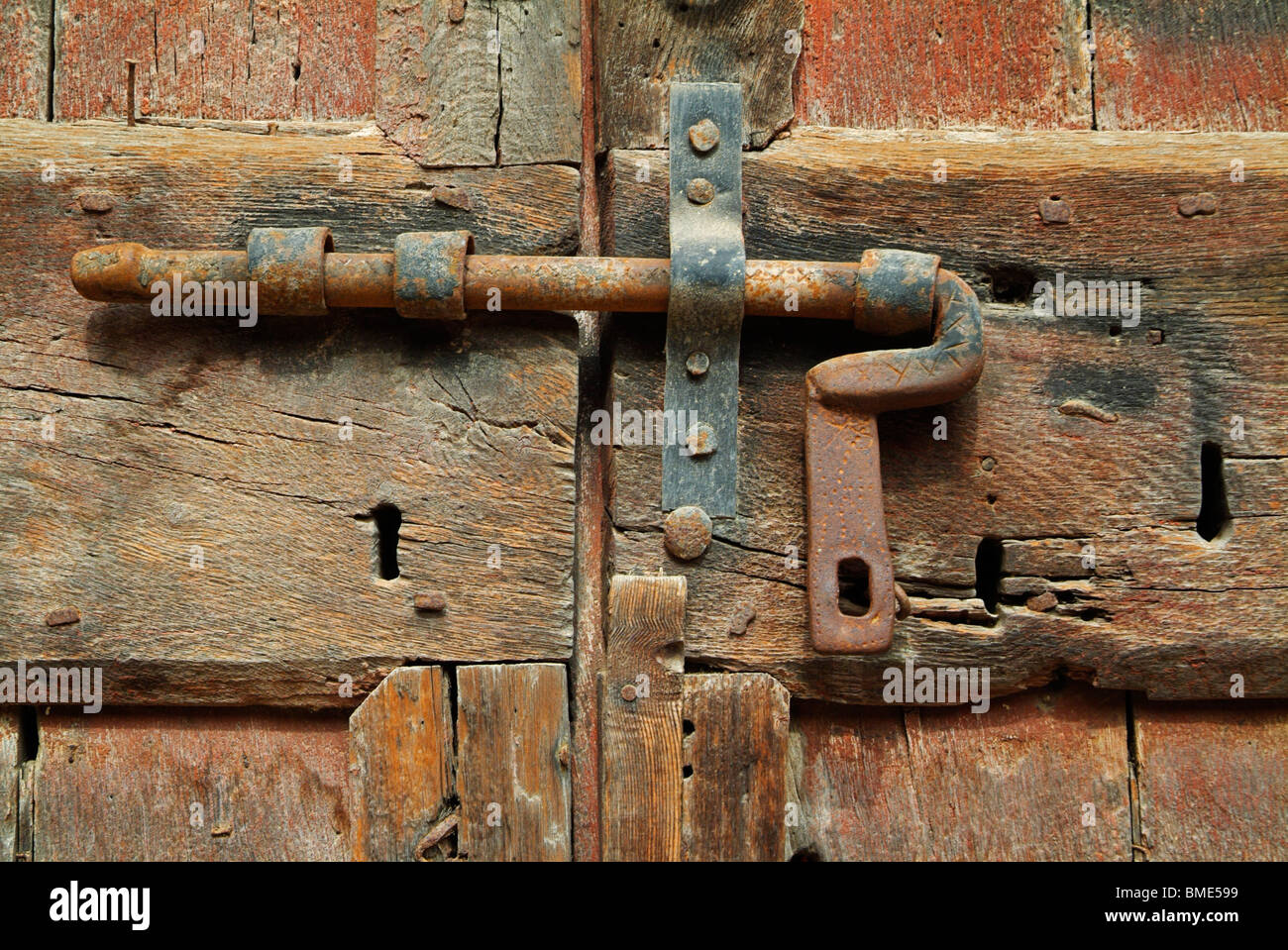 Rusty lock and bolt on a door Italy EU Europe Stock Photo - Alamy