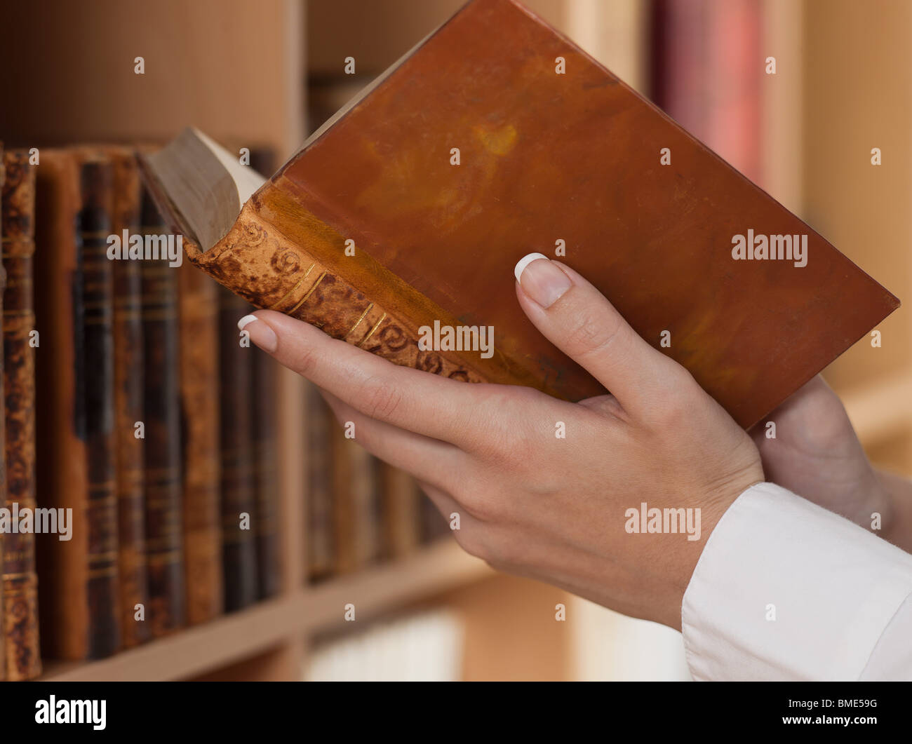 Hands ancient book hi-res stock photography and images - Alamy