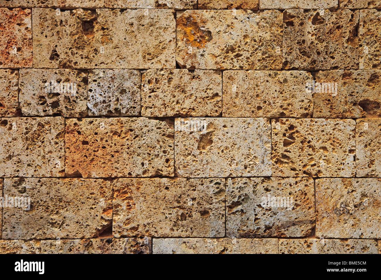 Wall made from sandstone bricks Stock Photo - Alamy