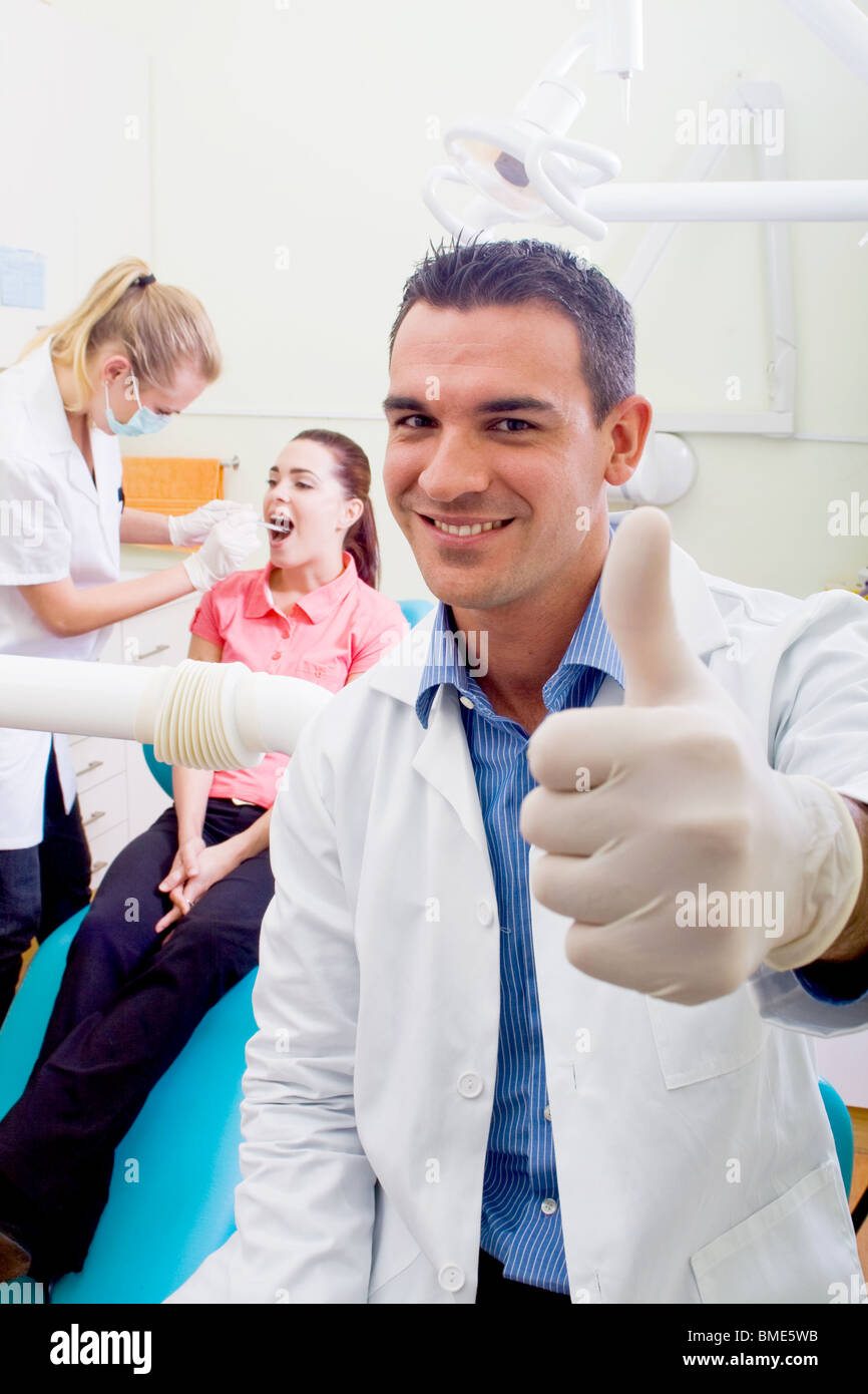 dentist thumb up Stock Photo - Alamy