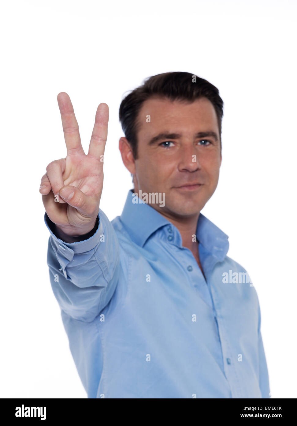 man portrait victory sign studio isolated on white background Stock ...