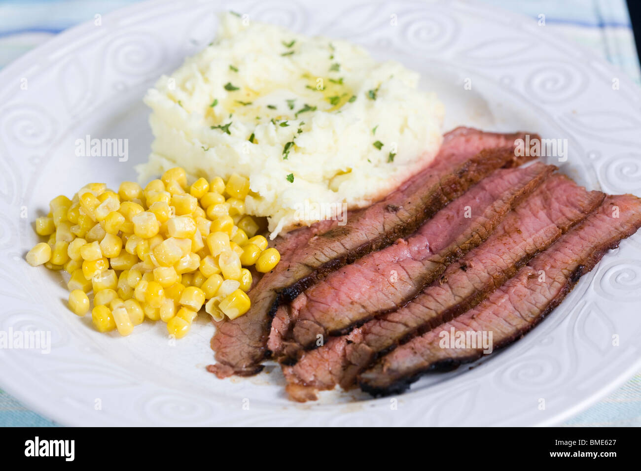 Steak And Potatoes And Corn