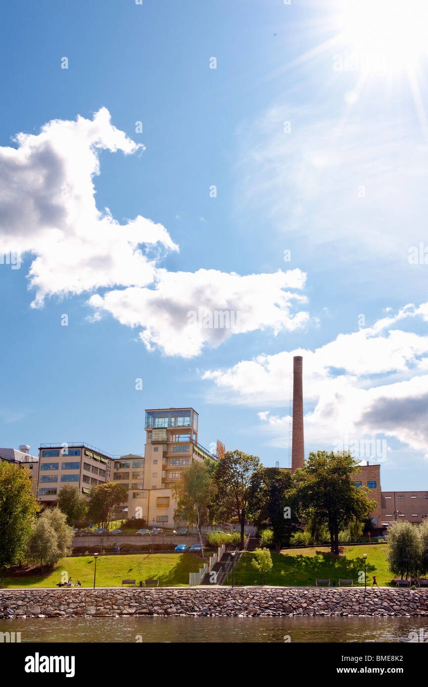 Clouds and sunlight over buildings Stock Photo - Alamy